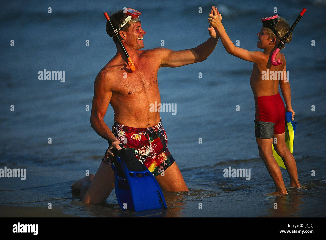 Sea, father, son, gesture, dance with, snorkel equipment outside, water ...