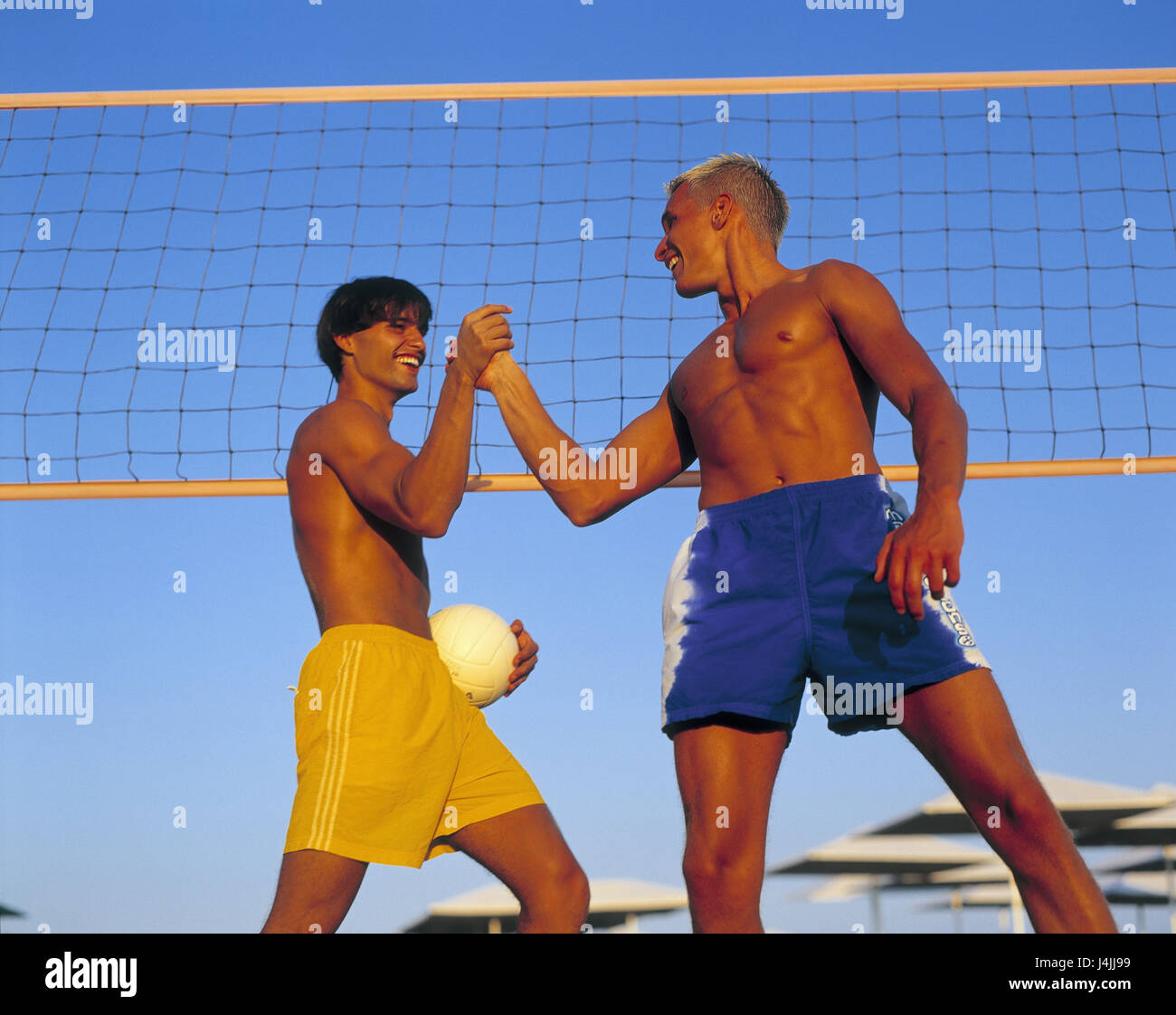 Beachvolleyball, teenager, boy, upper part of the body freely, slap ...