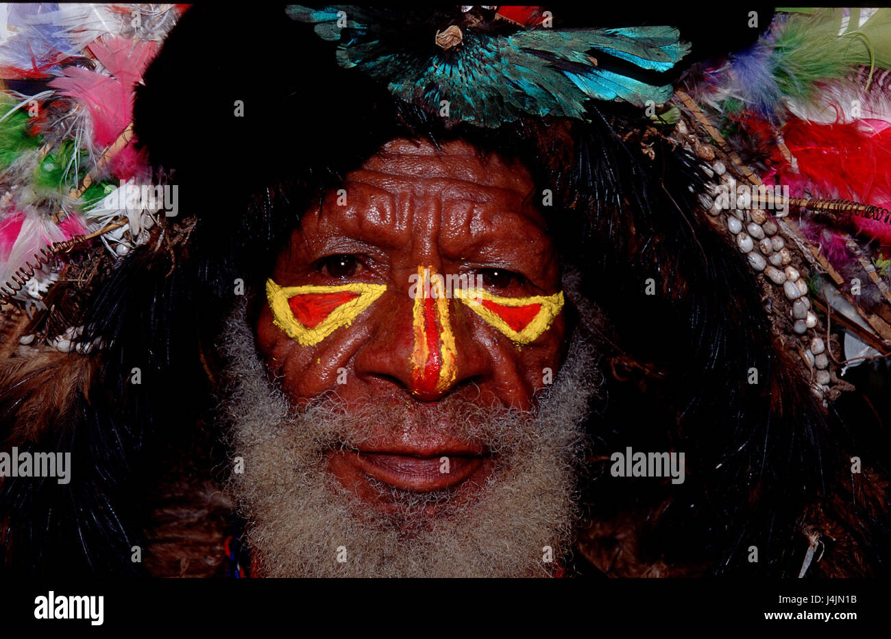 Papua New Guinea, man, Huli strain, feather jewellery, facial painting ...