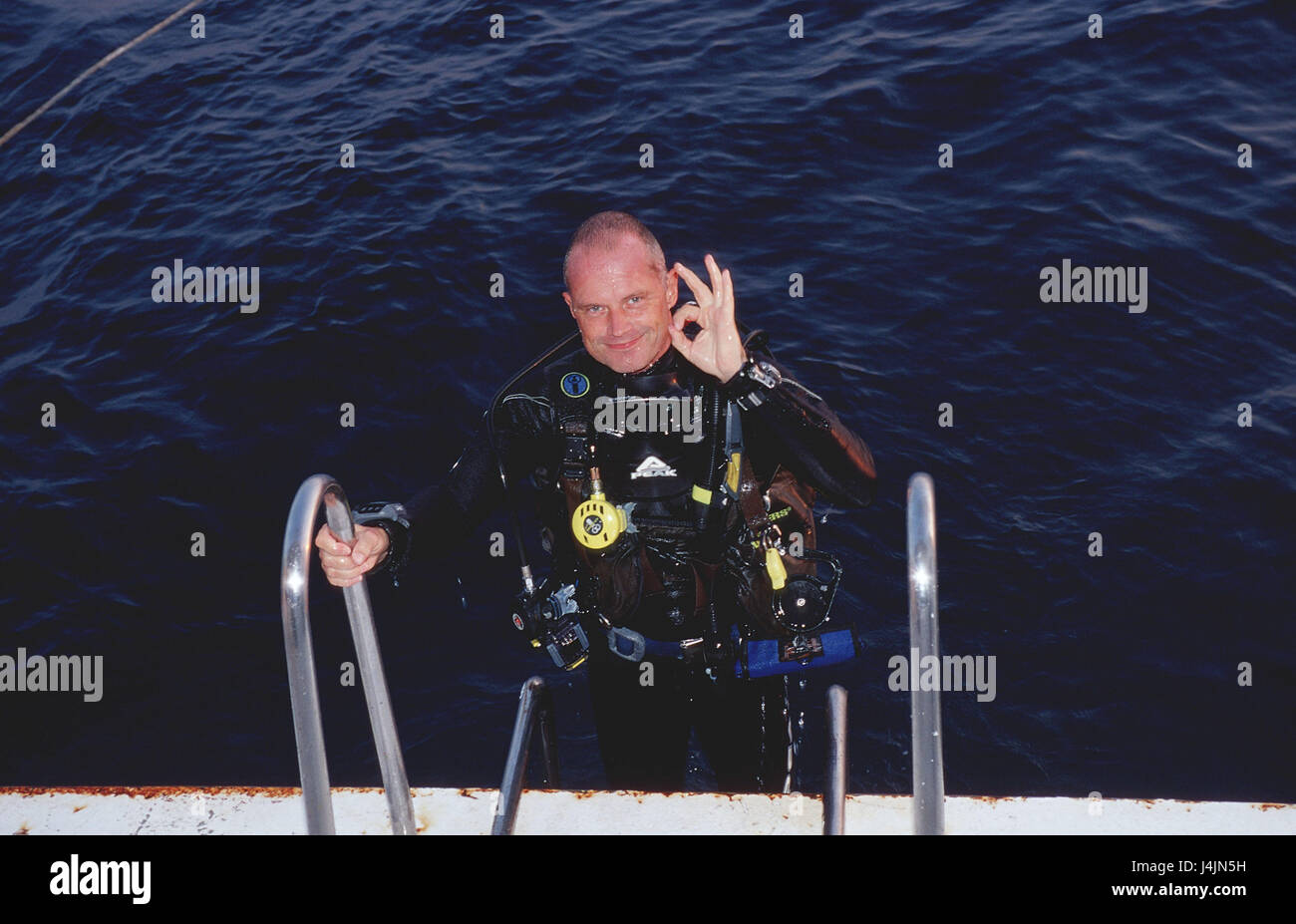 Boot, detail, conductor, diver, gesture Stock Photo - Alamy