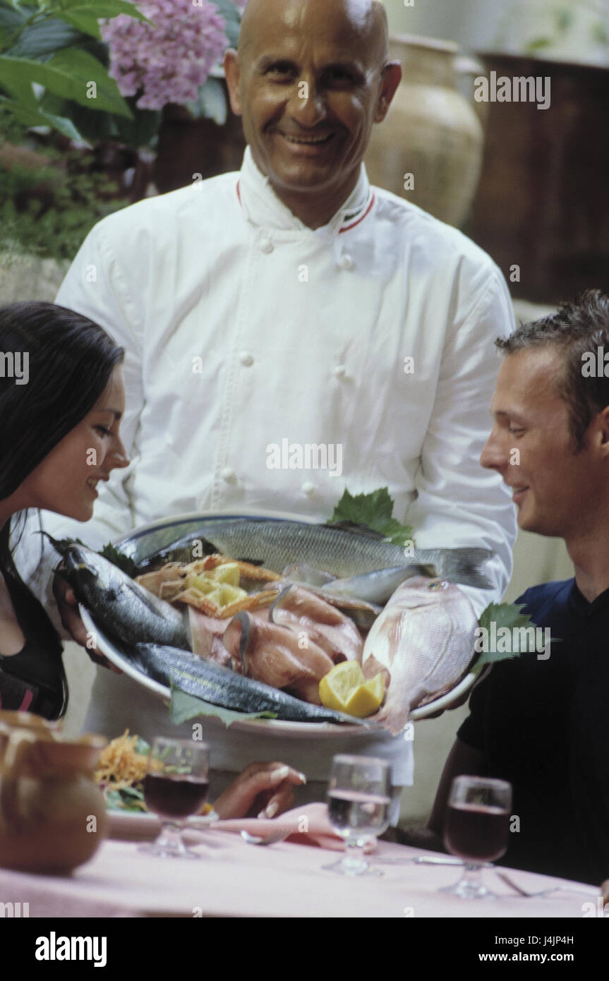 Restaurant, cook, fish choice, present, couple, select, detail inside ...