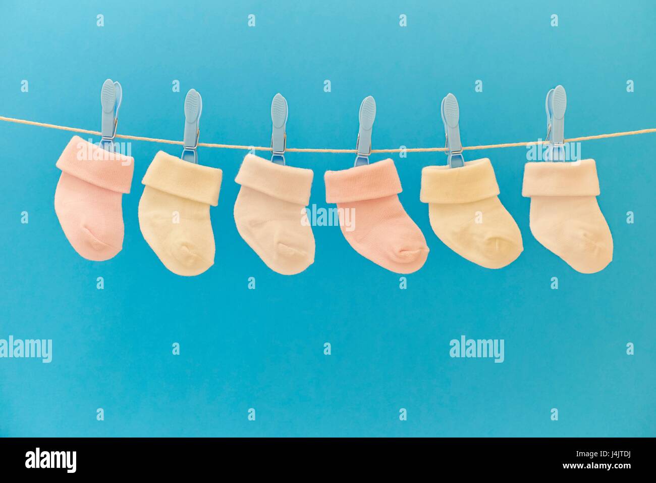 Baby clothes on washing line hi-res stock photography and images - Alamy