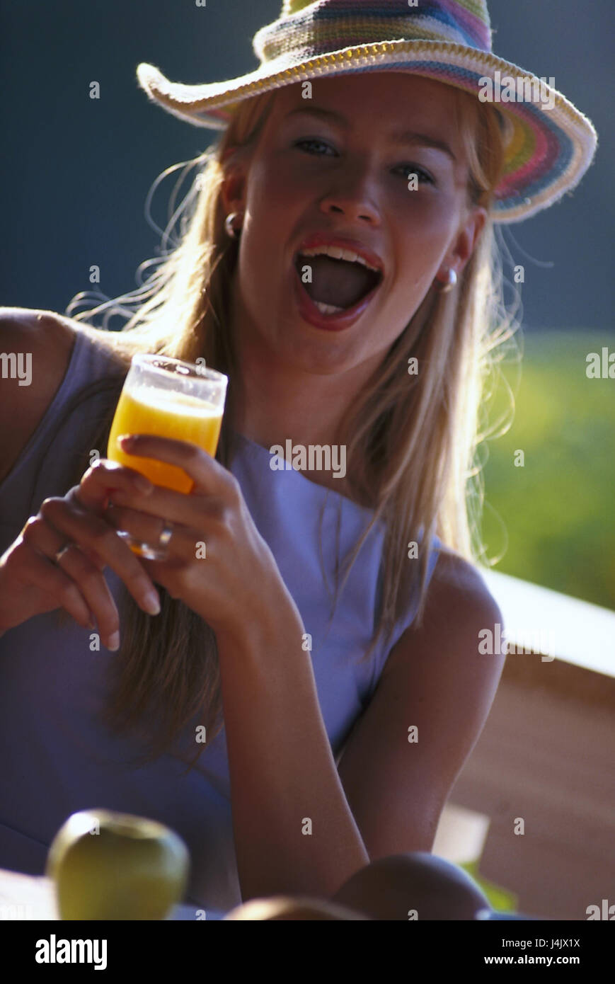 Terrace, woman, happily, solar hat, orange juice, portrait outside ...