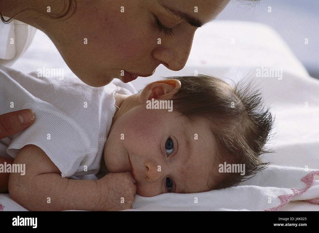 Mother, lie affectionately, baby, portrait inside, at home, child ...