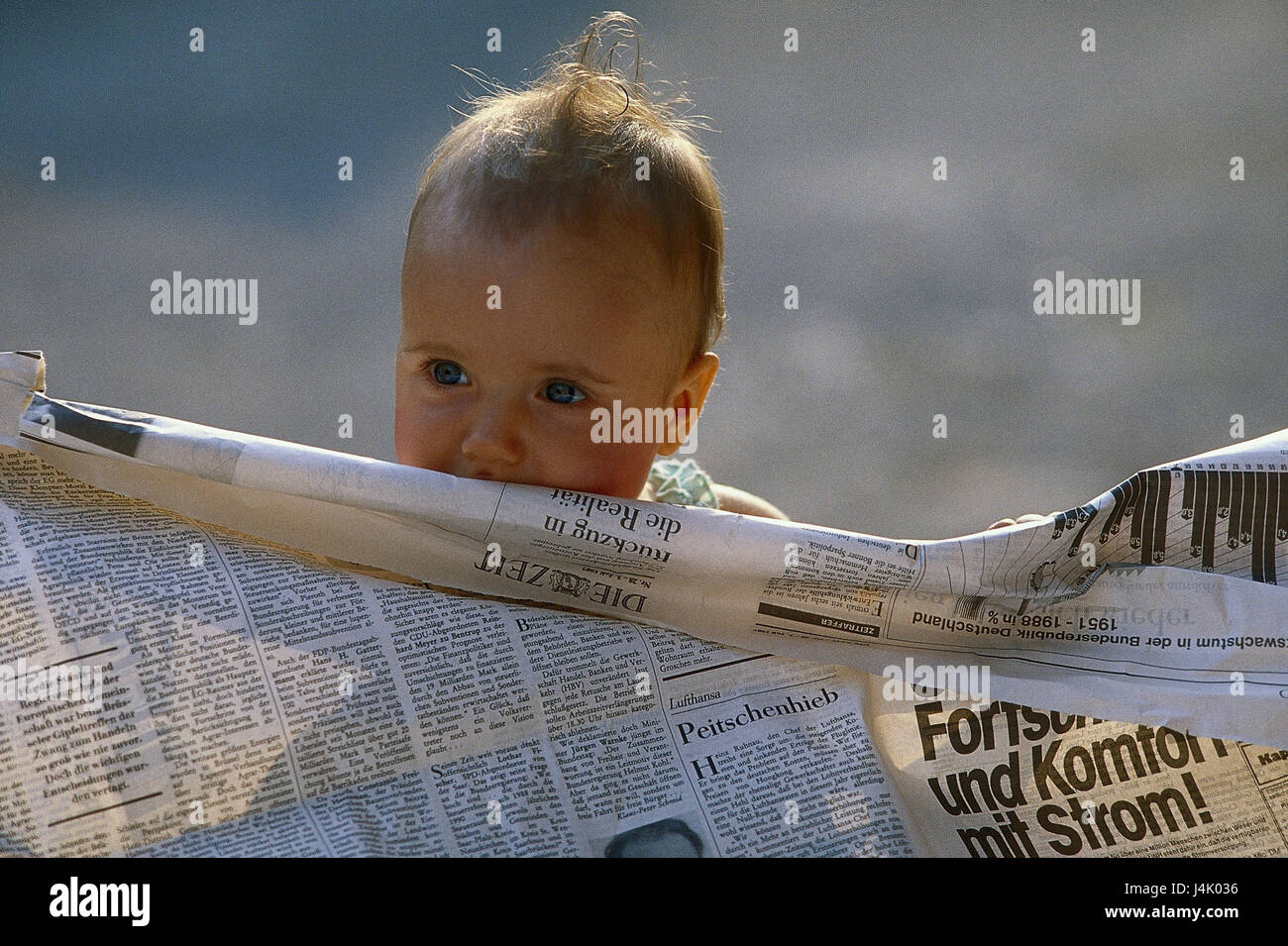 Baby Reading Newspaper