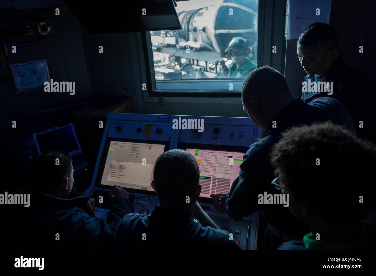 Sailors checked scales and gauges of engine components for a jet engine ...