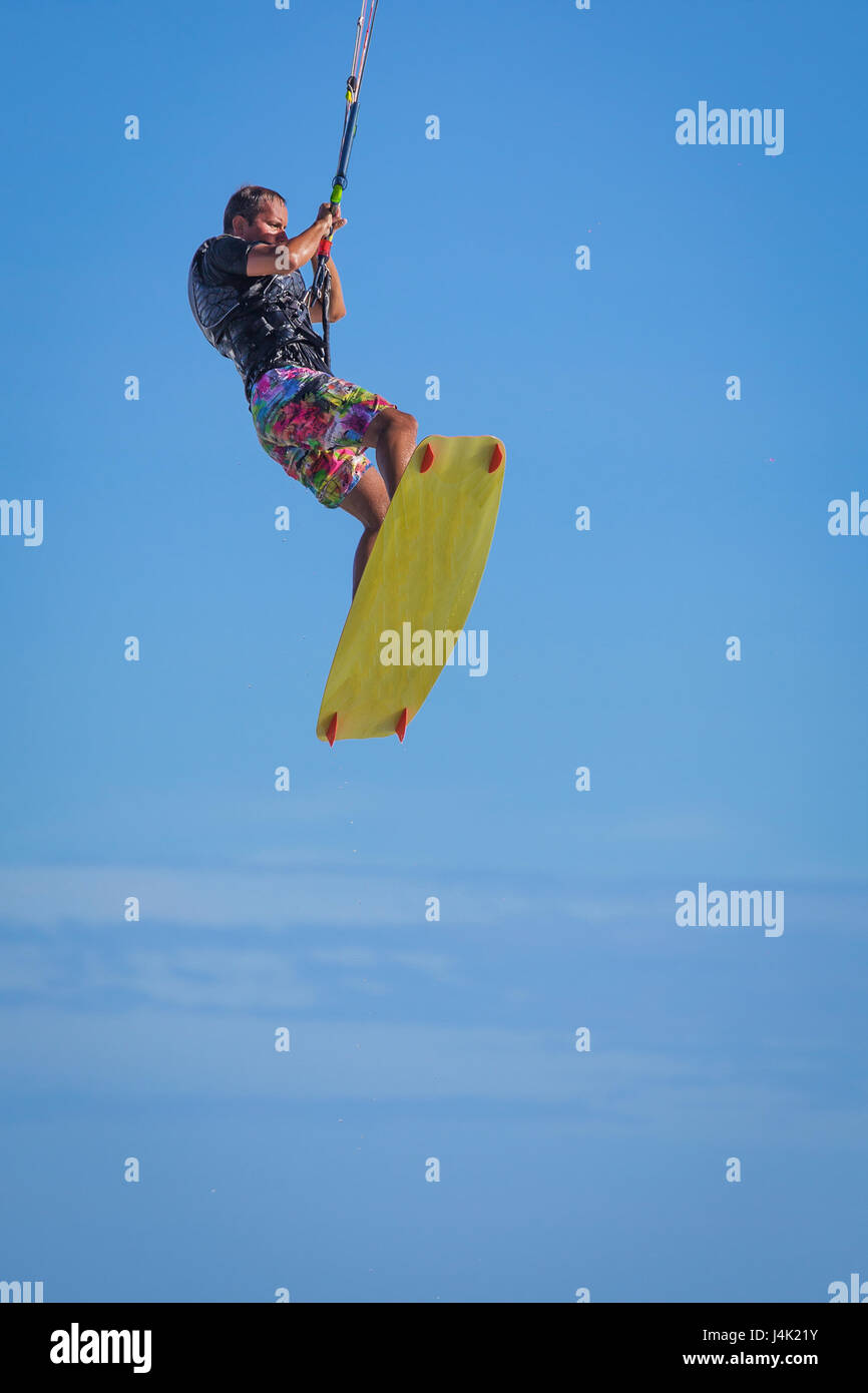 Athletic man jump on kite surf board on a sea waves Stock Photo - Alamy