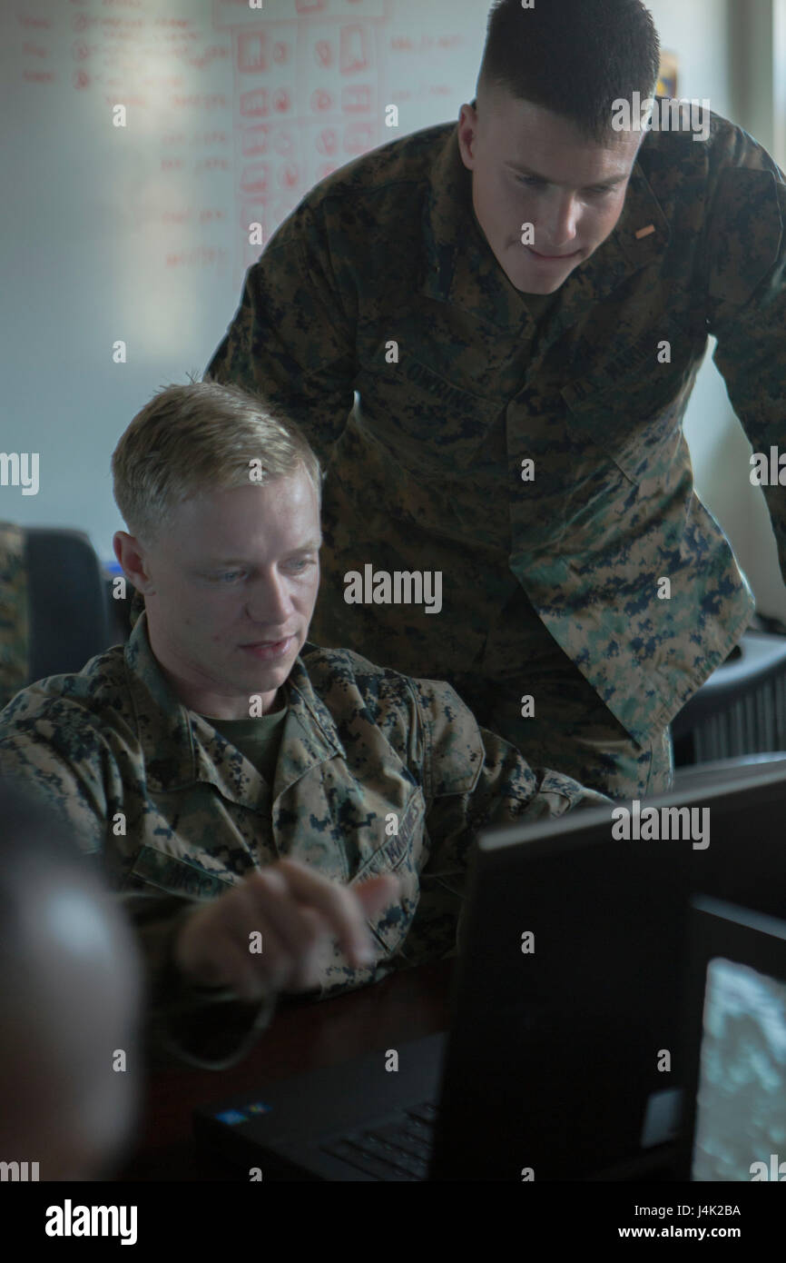 U.S. Marine Corps Sgt. Landon G. McCabe, left, a squad leader, and 2nd ...