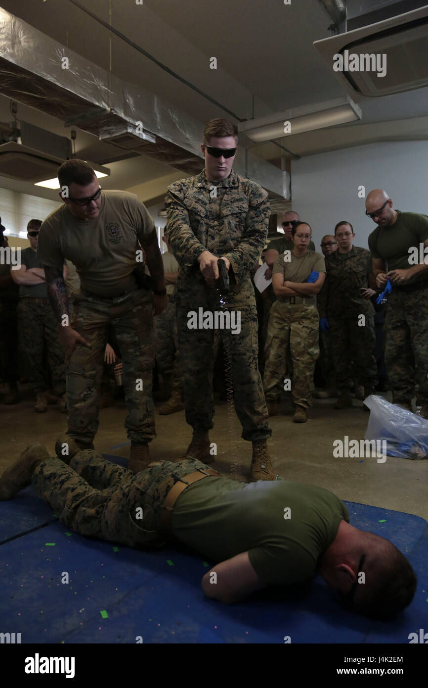 U.S. Marine Corps Cpl. Efrain Colon, military police, tenses and ...