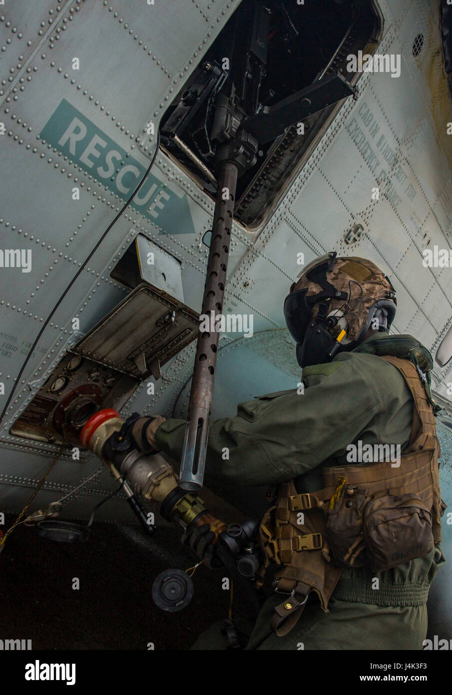 A U.S. Marine with Marine Heavy Helicopter Squadron 464 (HMH-464 ...