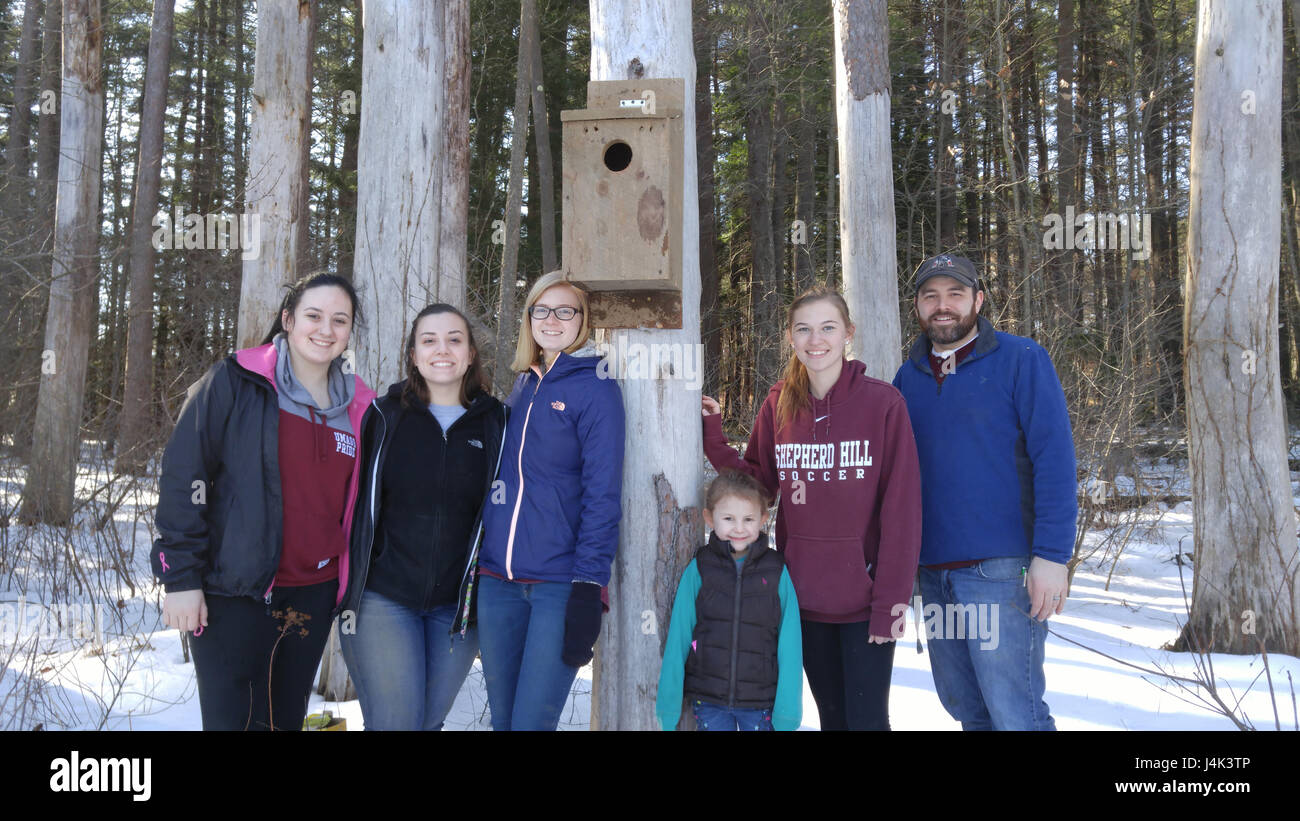 Students install a Wood Duck nesting box at Hodges Village Dam as part ...