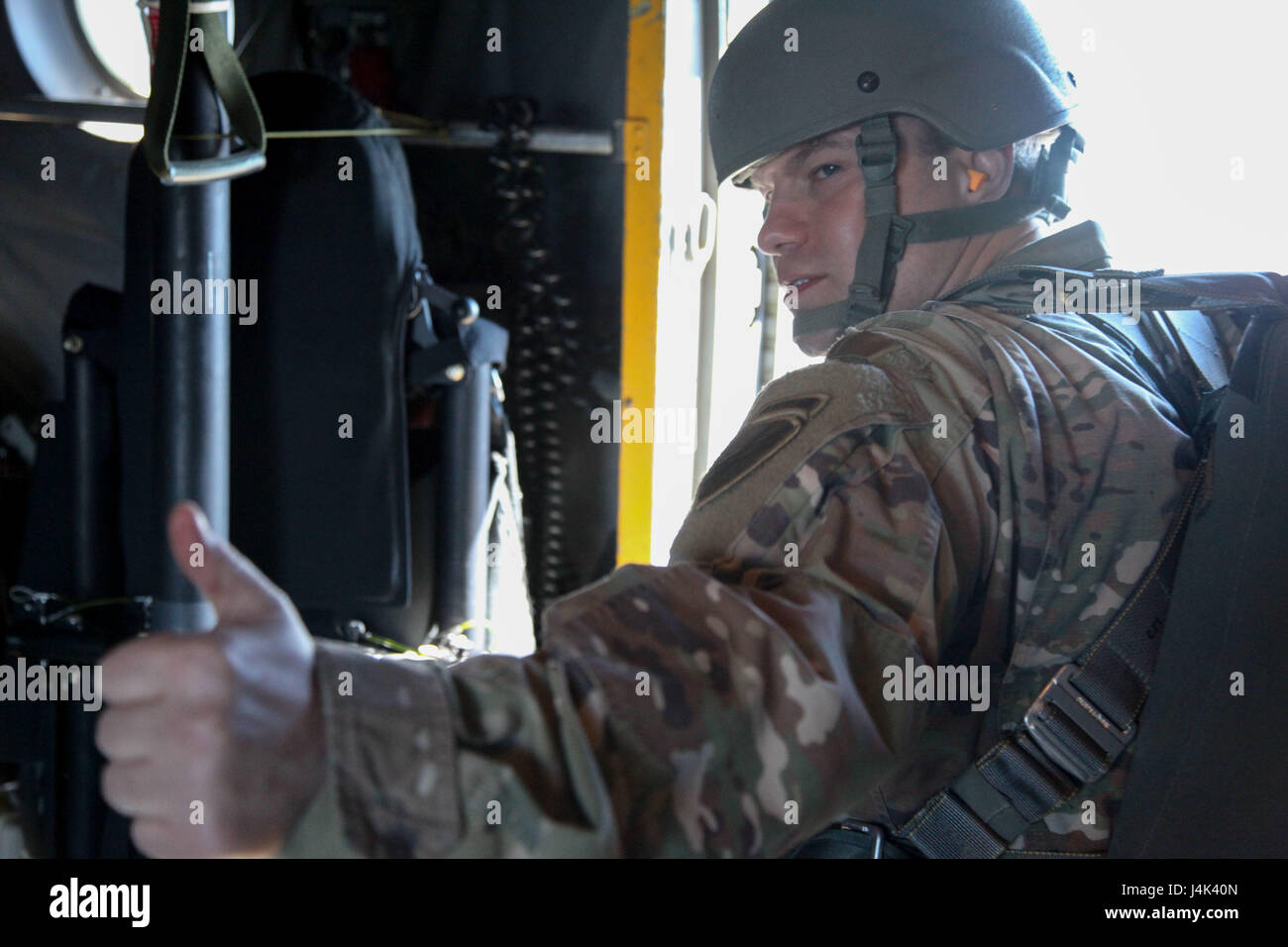 U.S. Army paratrooper of the 310th Psychological Operations Company ...