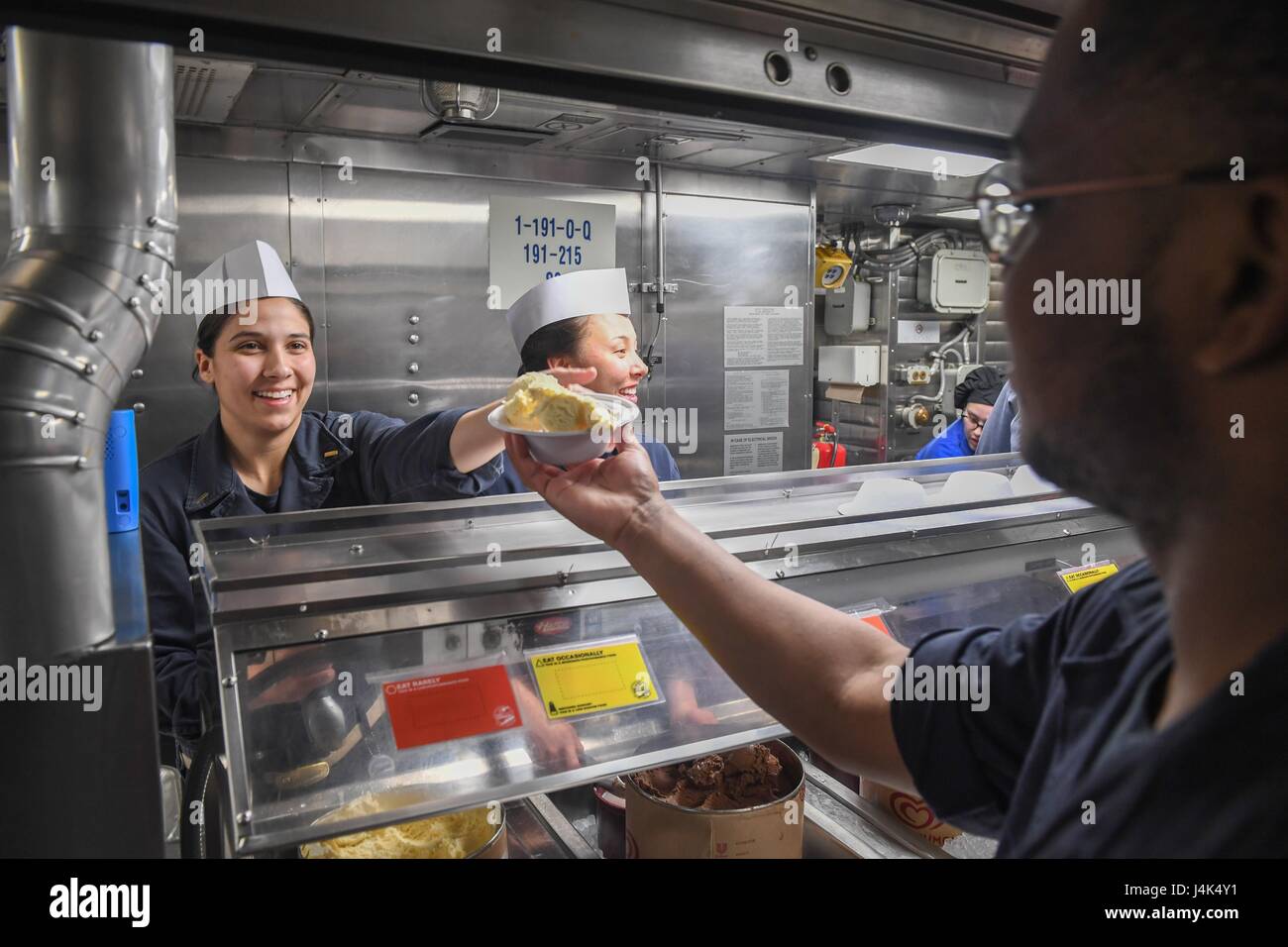 Sailors and crew aboard guided-missile destroyer USS Porter (DDG 78 ...