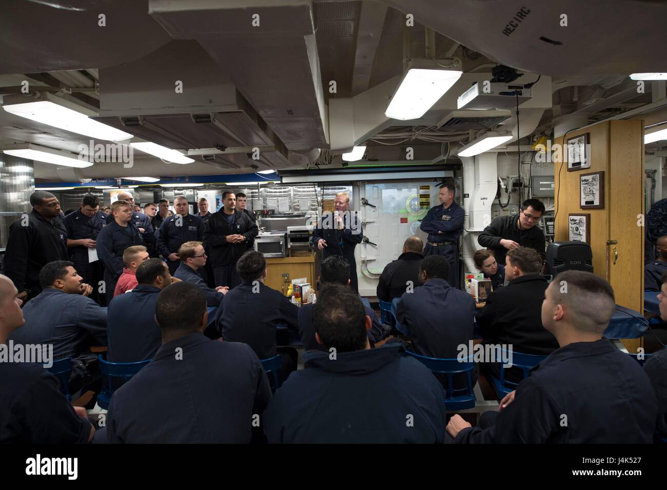 The commanding officer of USS Carney (DDG 64), an Arleigh Burke-class ...