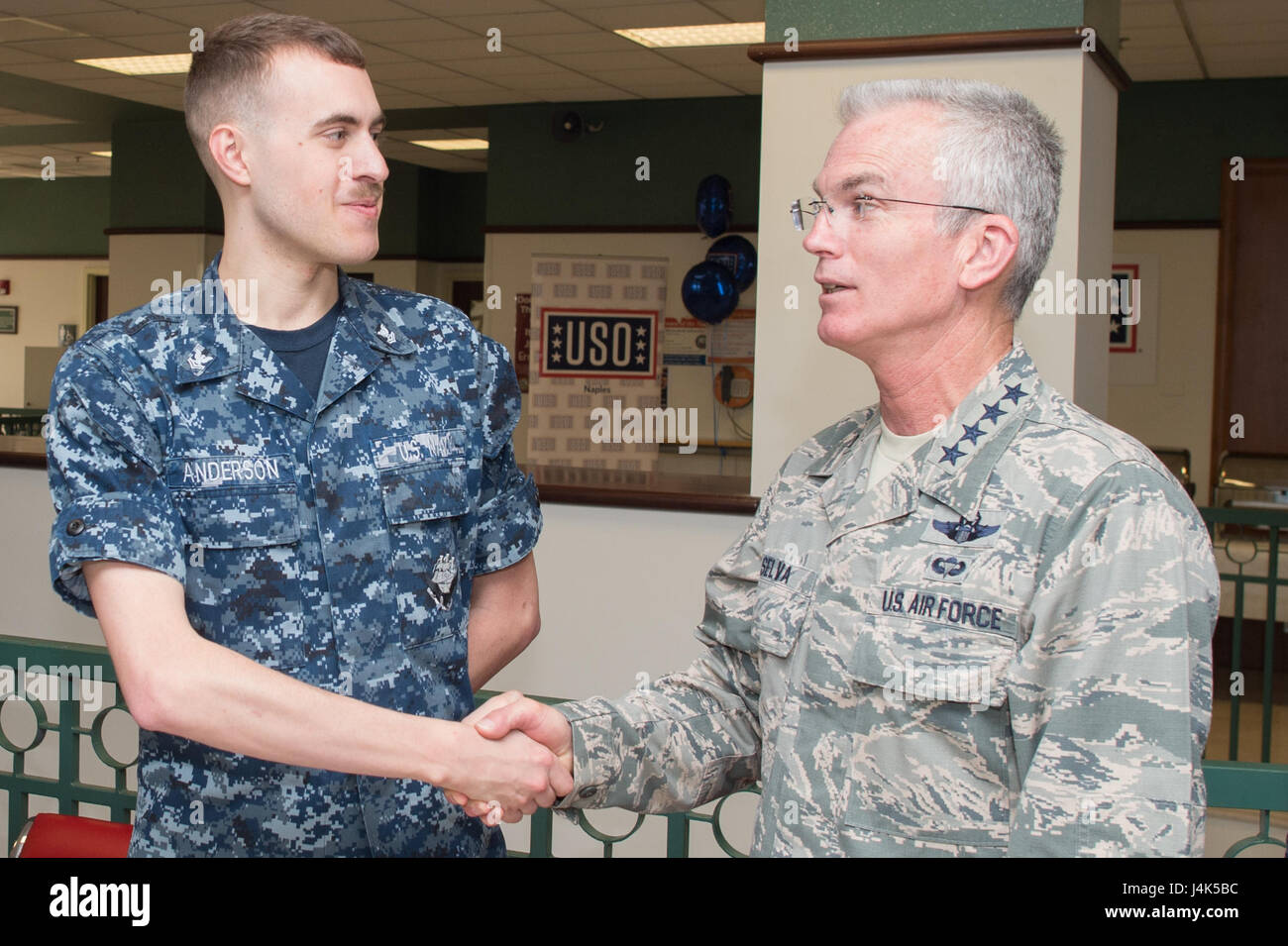 A U.S. Navy Sailor greets U.S. Air Force Gen. Paul J. Selva, Vice ...