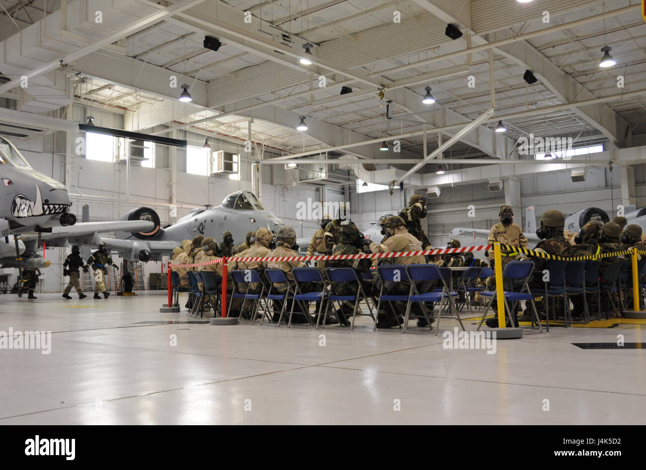 Airmen of the 442d Maintenance Squadron gather in a designated safe ...