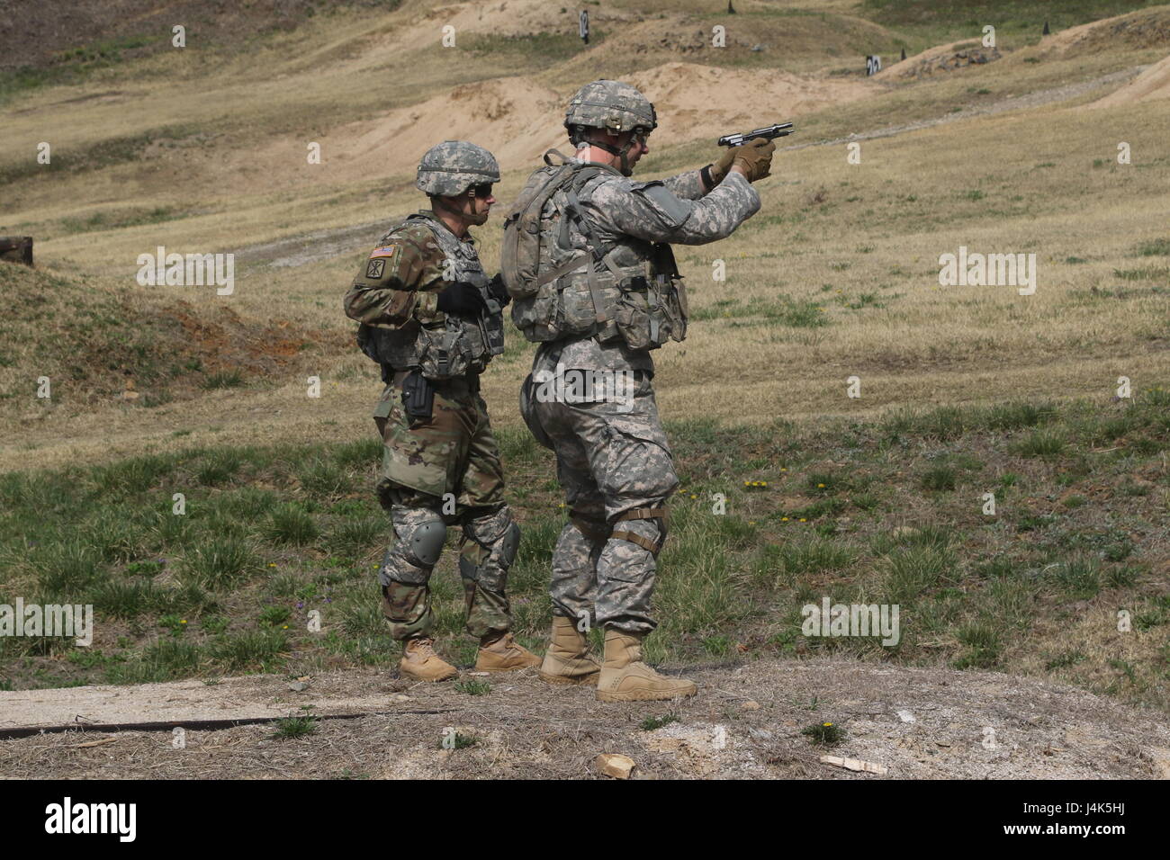 A participant for 2nd Infantry Division Best Warrior competition fires ...