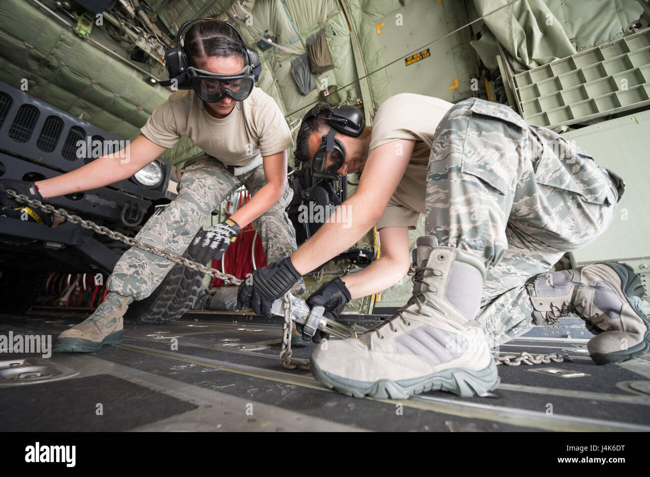 U.S. Air Force Senior Airman Ariel Godinez (left) and Staff Sgt. Shaun ...