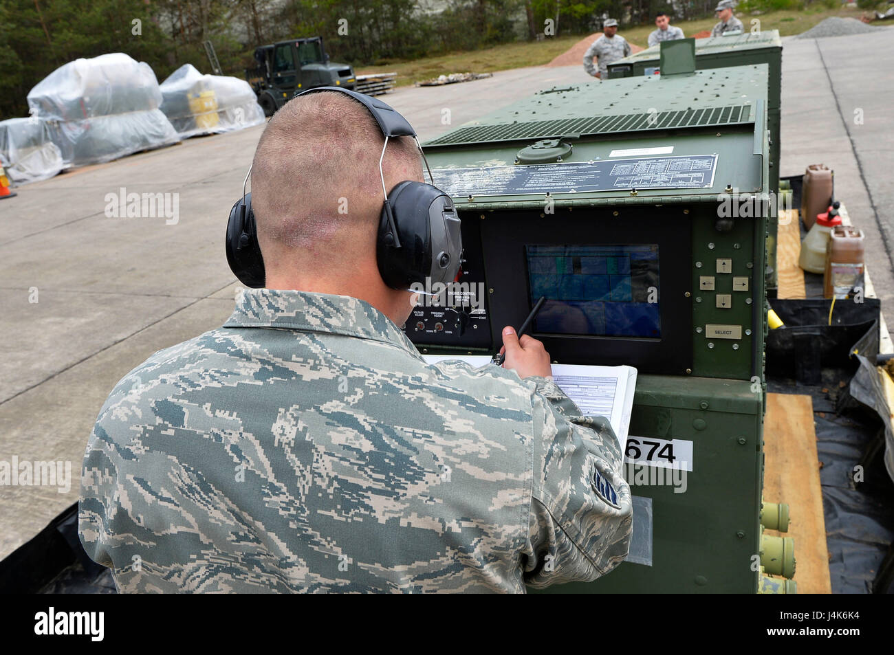 Cables rest in the ports of a communications system on Ramstein Air ...
