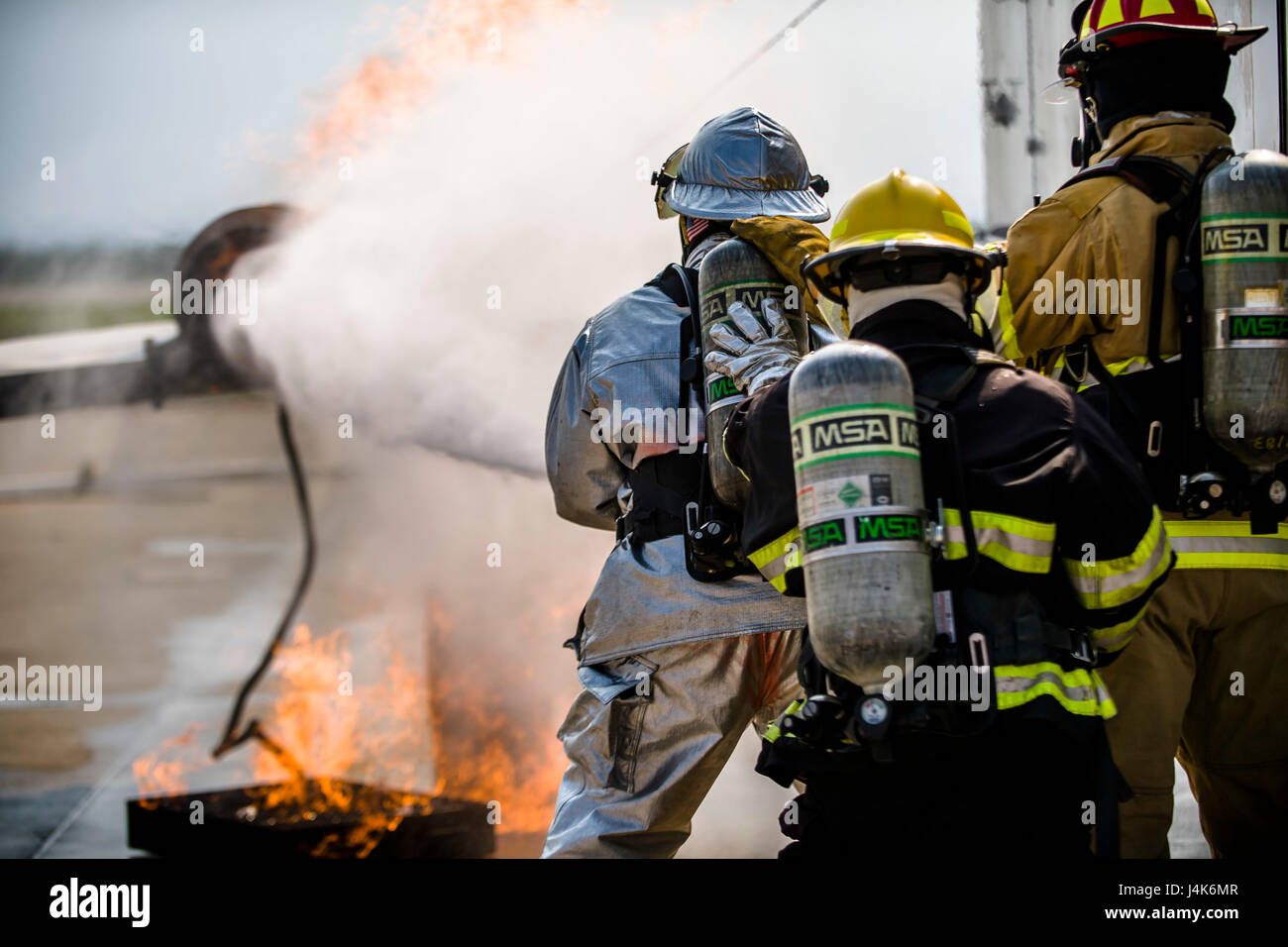 Firefighters from Central America learn new fire hose techniques at a ...