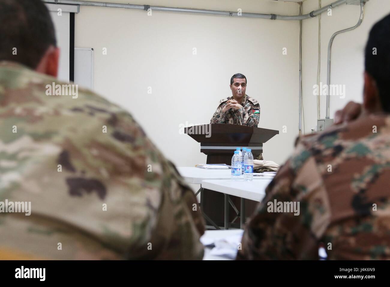 A military judge from the Jordan Armed Forces- Arab Army leads a ...
