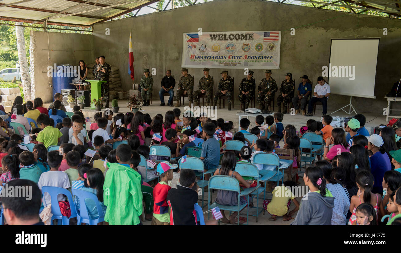 Philippine Army Capt. Rolly Basibas speaks to locals during a community ...