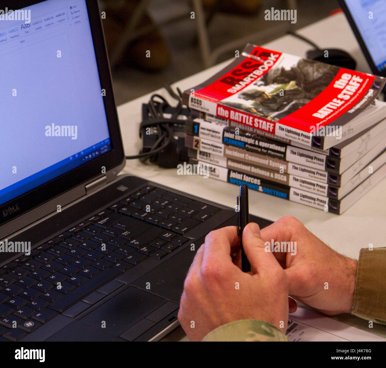 81st Troop Command staff work in the Joint Operation Center during ...
