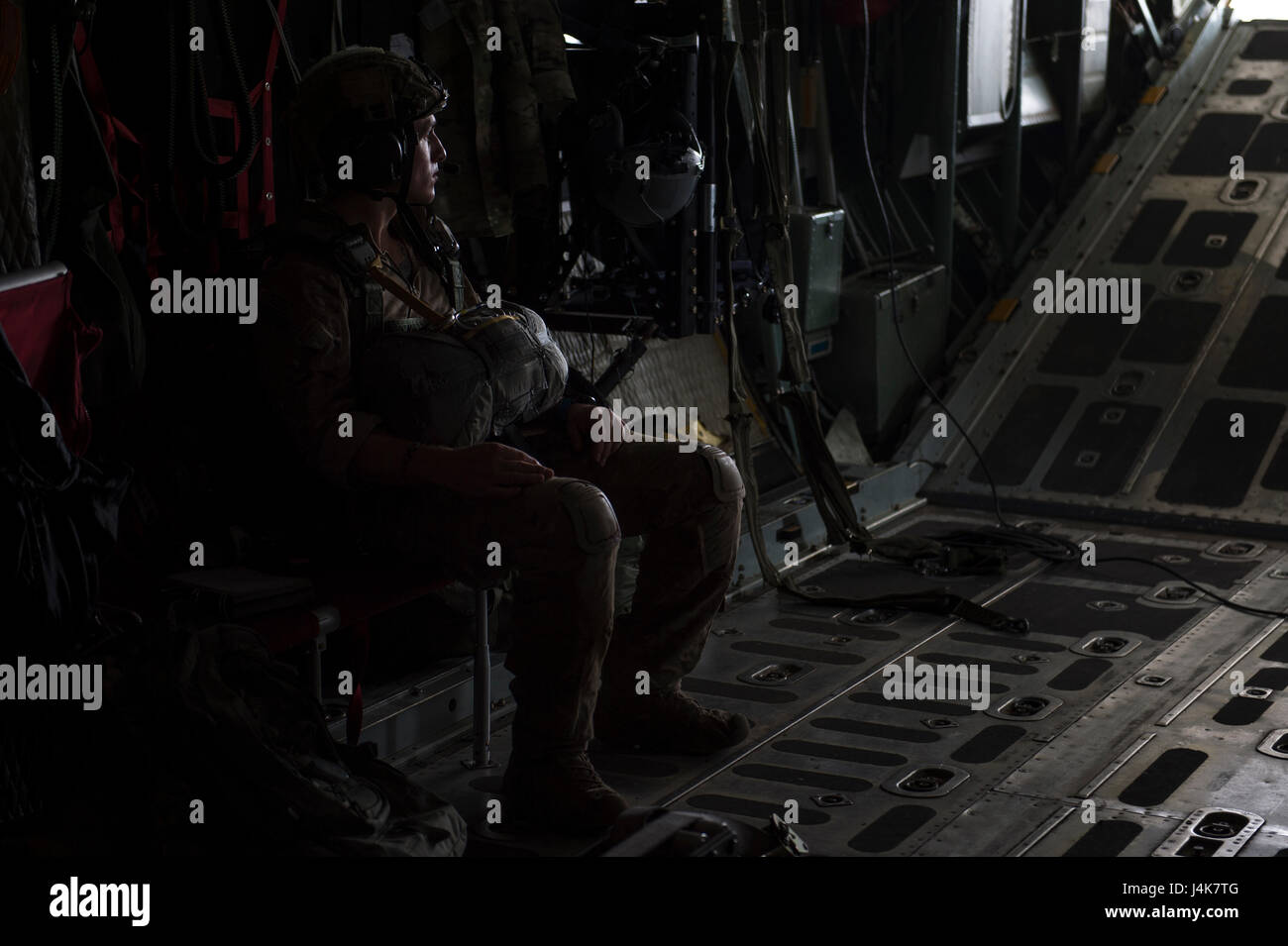 A pararescue Airman from the 82nd Expeditionary Rescue Squadron watches ...
