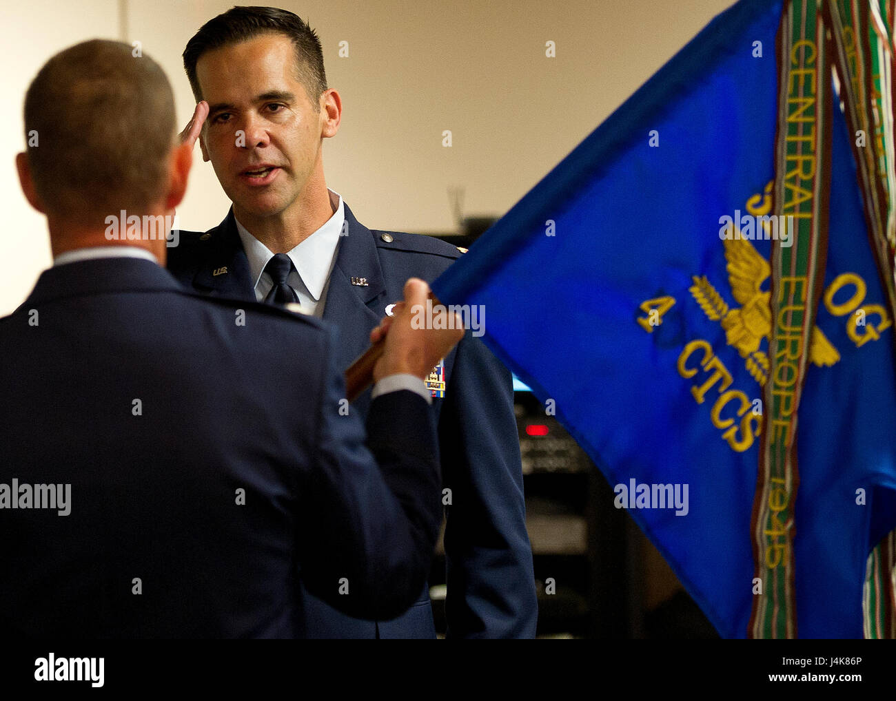 U.S. Air Force Maj. Hamilton Underwood salutes U.S. Air Force Lt. Col ...