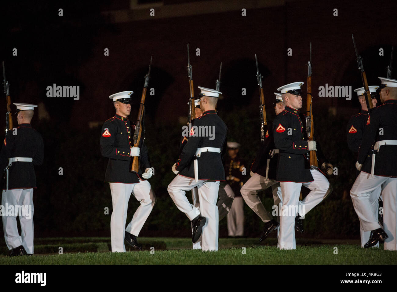 The Marine Corps Silent Drill Platoon performs during an evening parade ...
