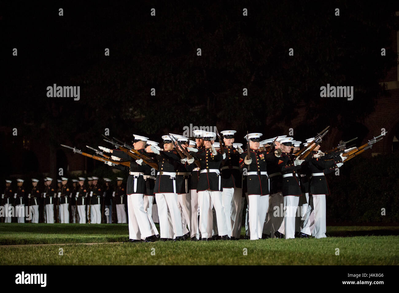 The Marine Corps Silent Drill Platoon performs during an evening parade ...