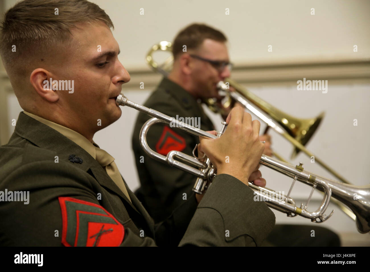 A Marine band member plays the trumpet during the Purple Star Memorial ...