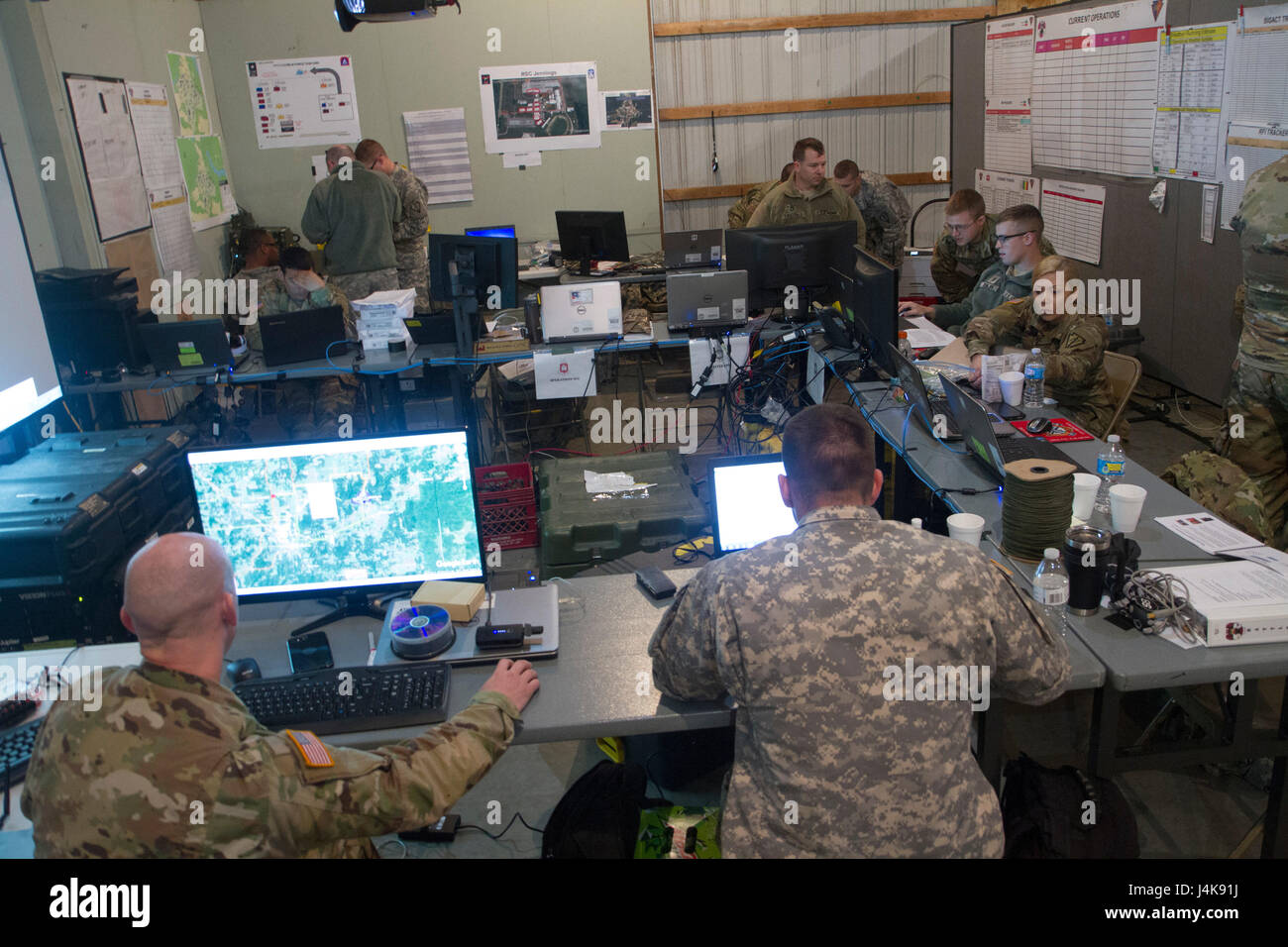 Soldiers in the 113th Engineering Brigade Headquarters Command work in ...