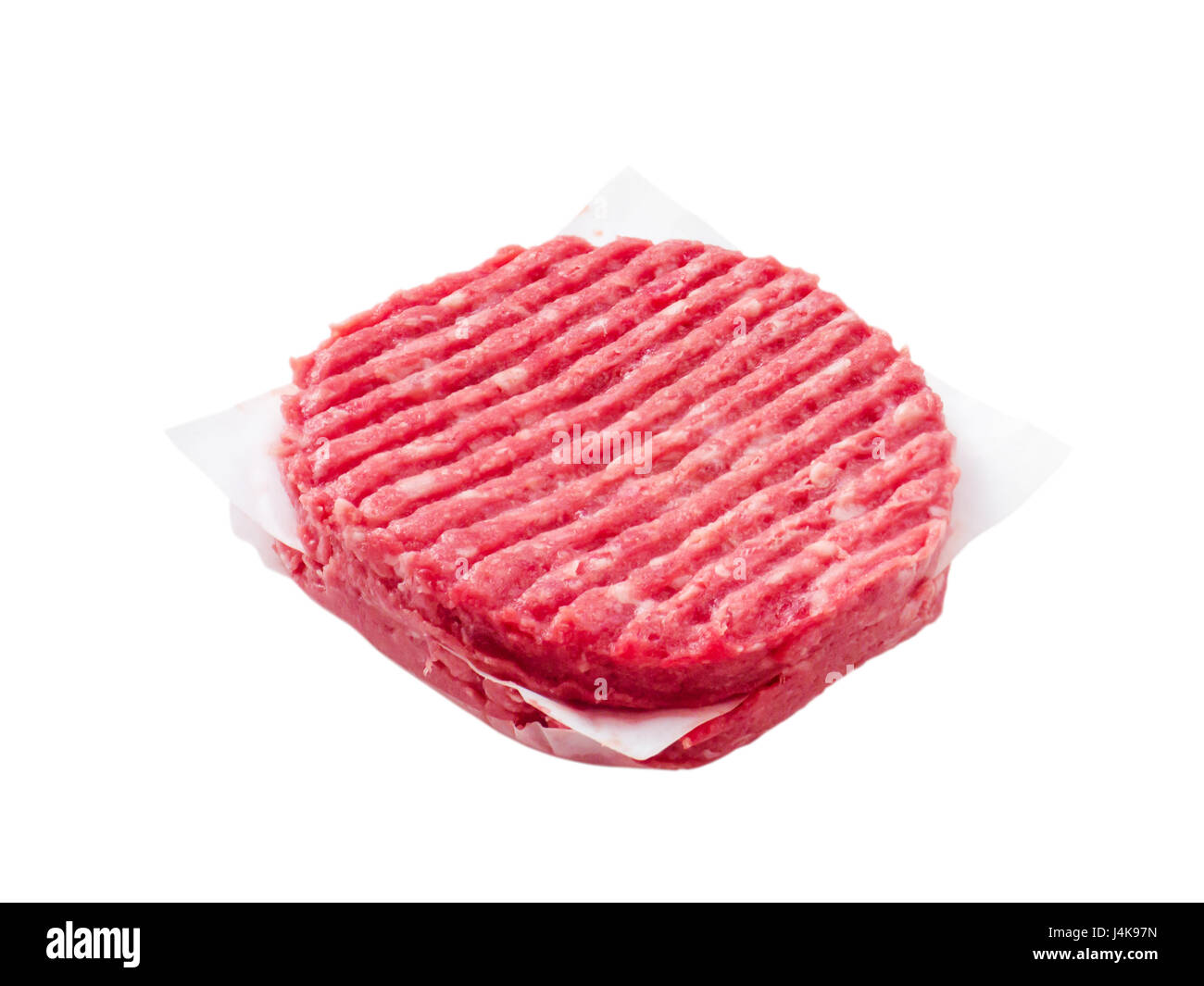 Two mixed pork and beef burgers separated by paper sheets isolated on ...