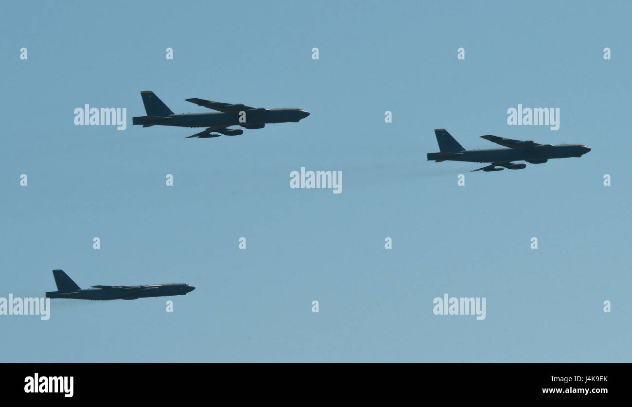 Three B-52 Stratofortresses perform a heritage flyover to kick off the ...