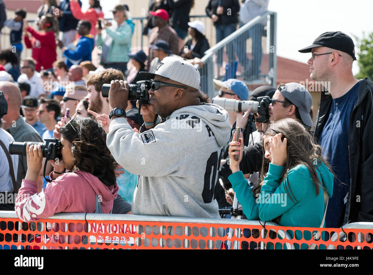 Spectators take photos of the United States Air Force Thunderbirds ...