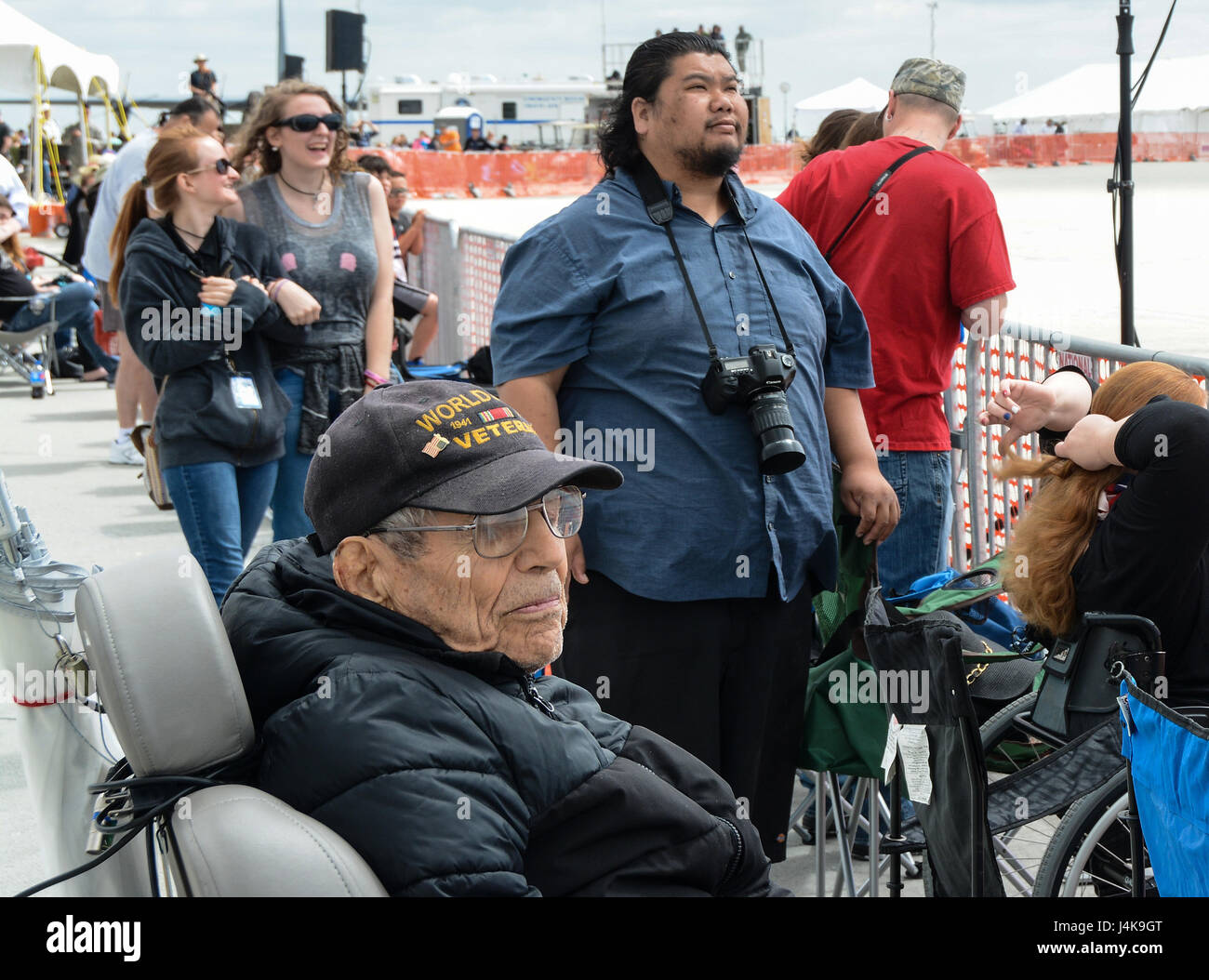 Crowds watch an aerial performer at Wings Over Solano, the Travis Air ...