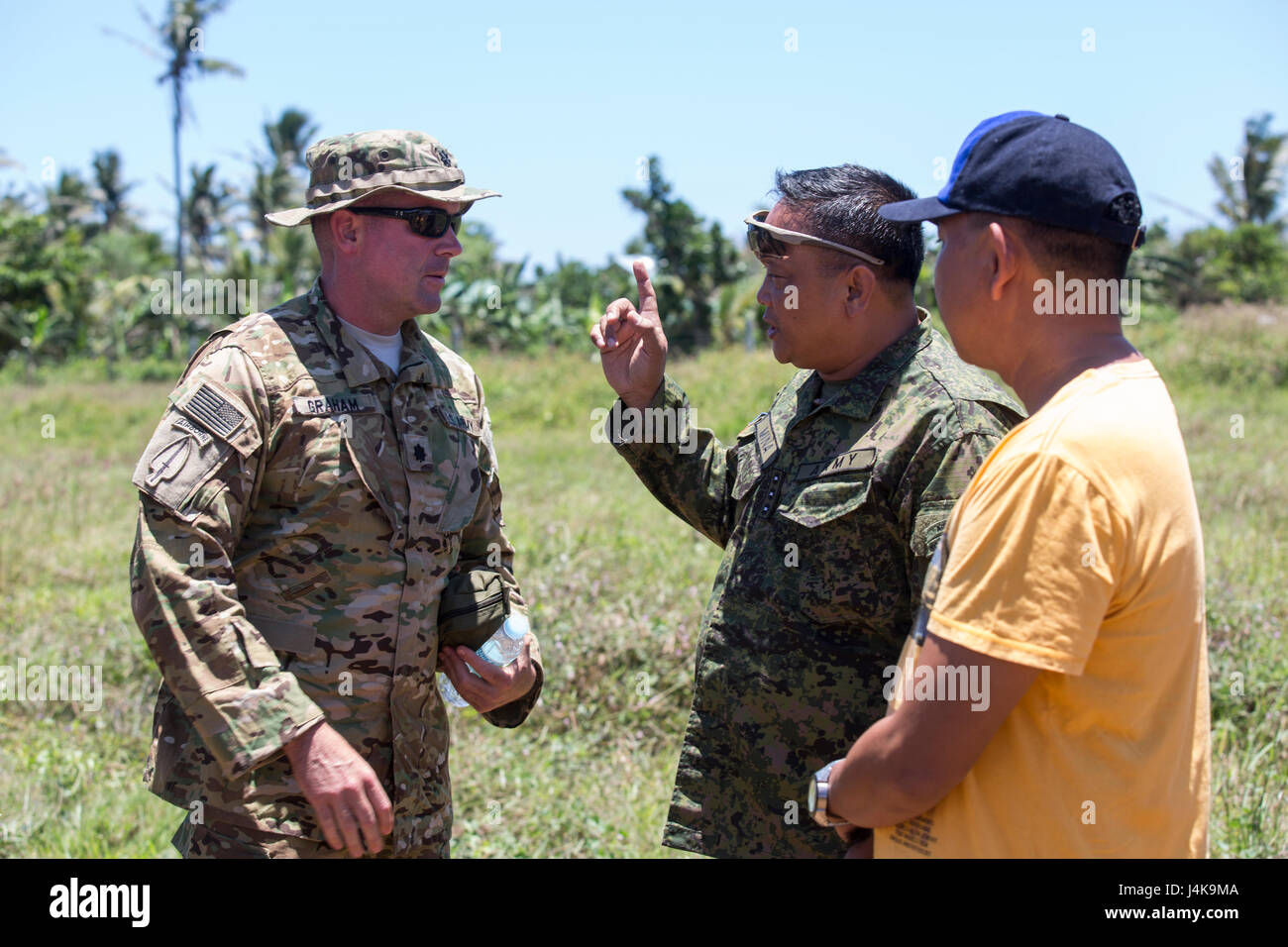 U.S. Army Lt. Col. Andrew Graham, Philippine Army Col. Lawrence Mina ...