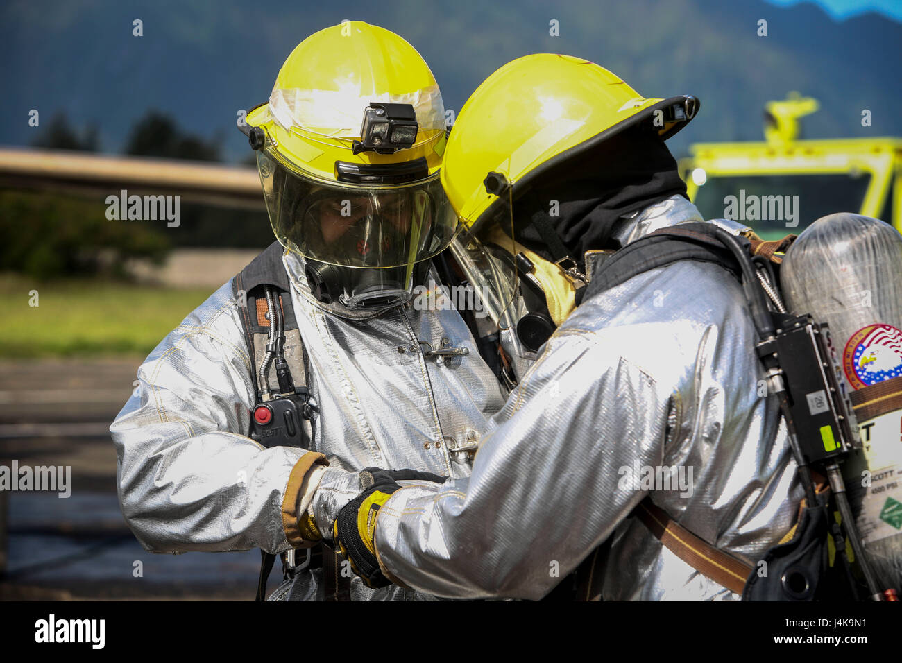 Marines with Aircraft Rescue and Firefighting help secure each other’s ...