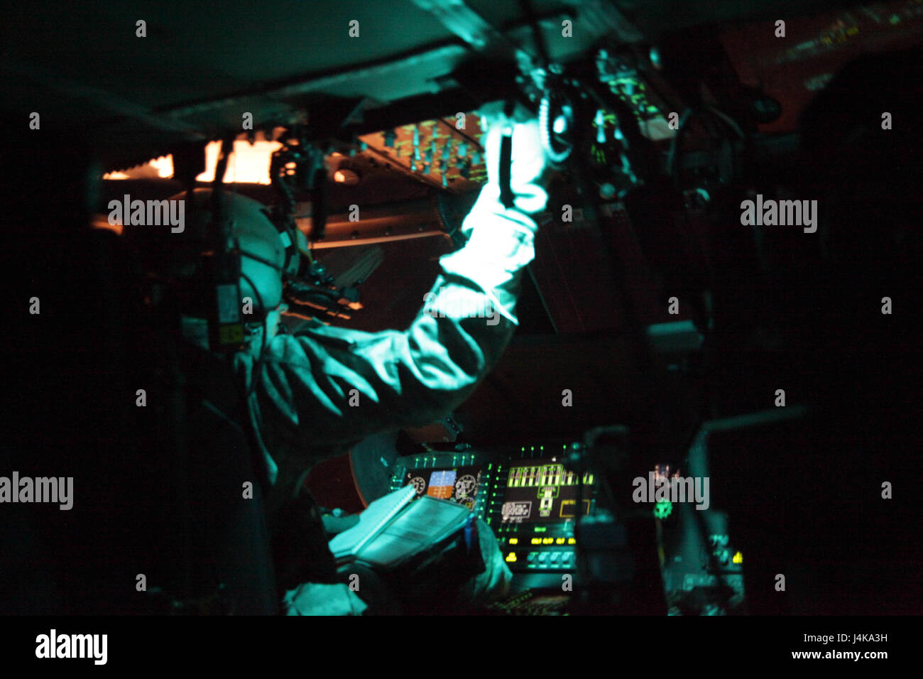 U.S. Army Capt. Bryan Rupert conducts pre-flight checks in a UH-60 ...