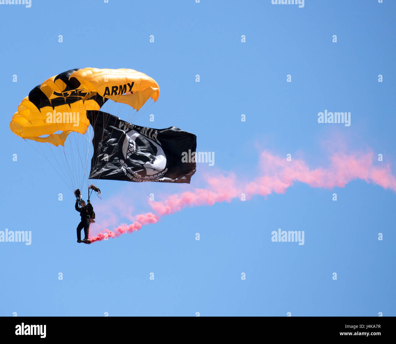 U.S. Army Golden Knights parachute team perform skydiving maneuvers ...