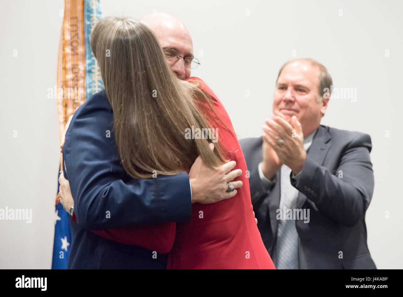 Col. Lisa Manion hugs her husband, Col. Michael Manion, former 403rd ...