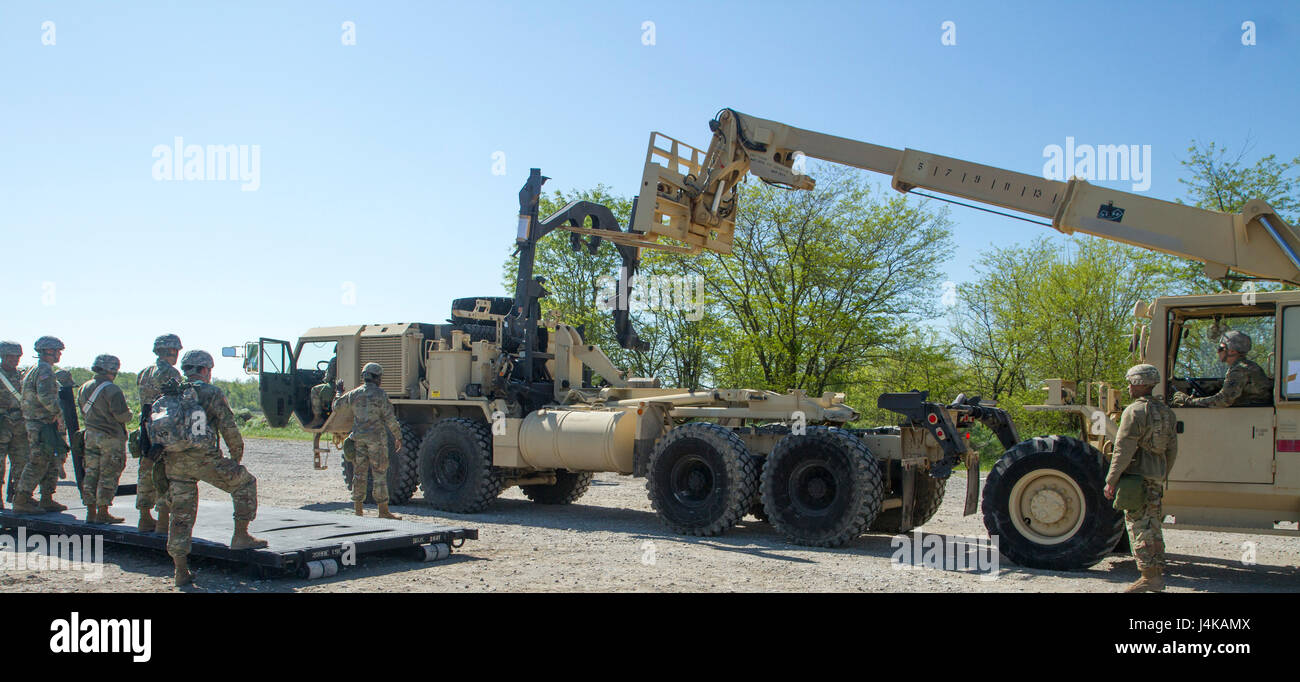 Soldiers with the 119th Inland Cargo Transportation Company conduct ...