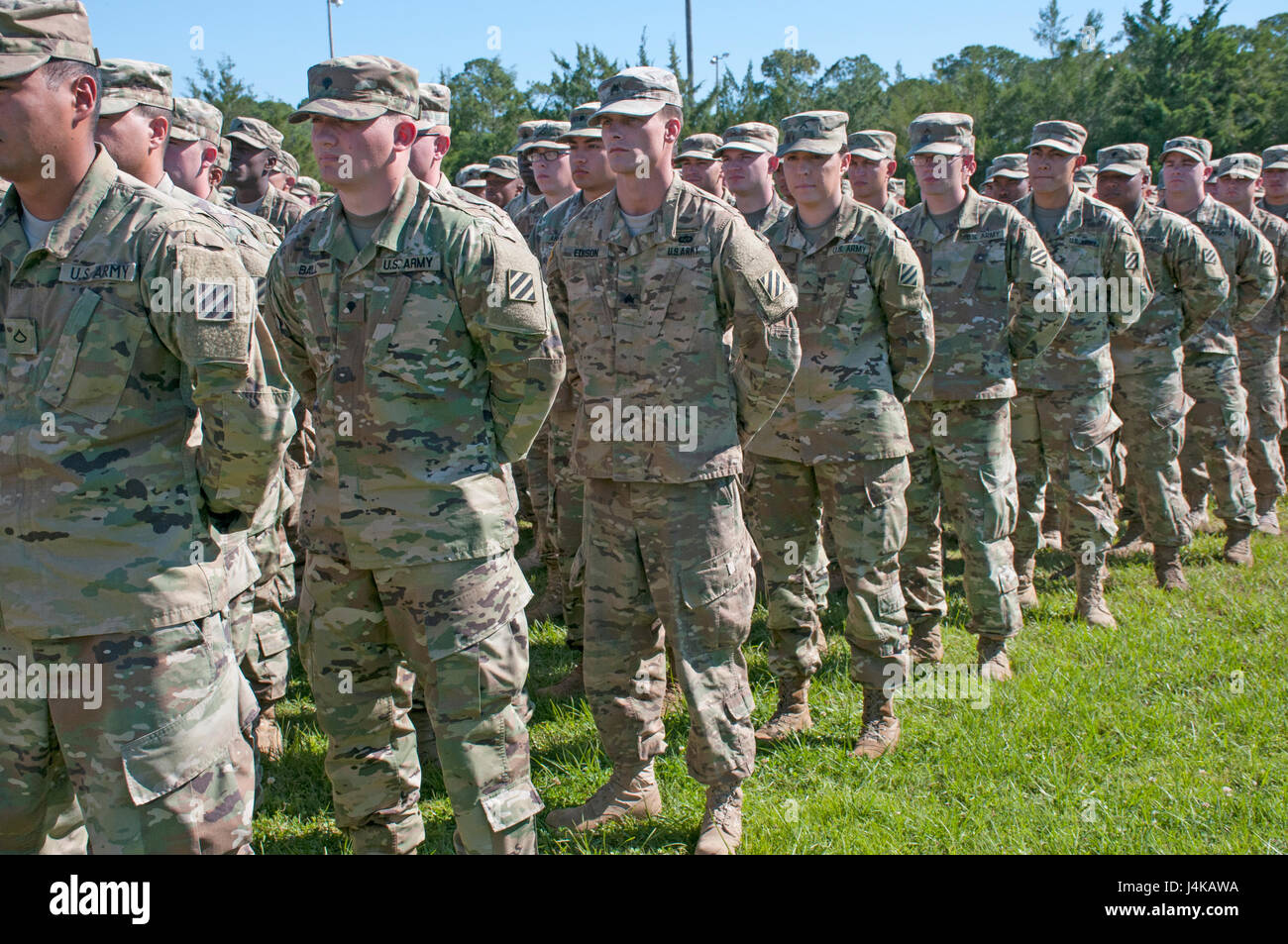 Soldiers of 3rd Infantry Division stand at parade rest during the ...