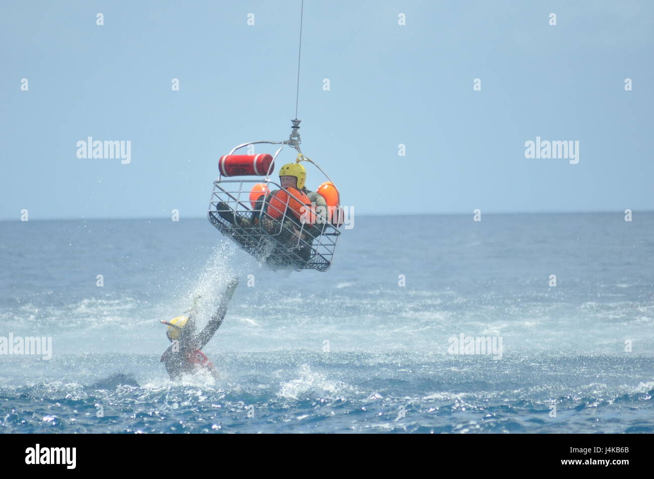 The U.S. Coast Guard diver "rescues" a member of the 53rd Weather ...