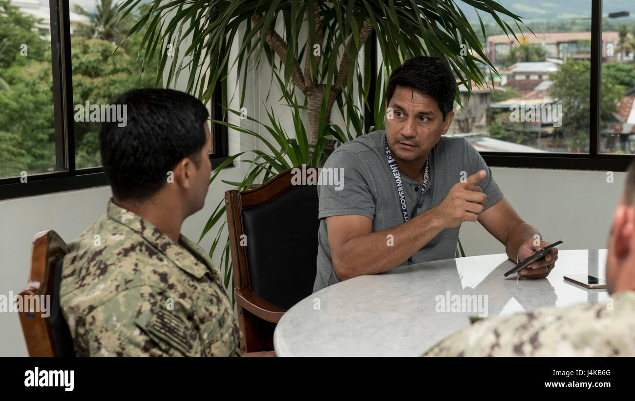 Ormoc City Mayor Richard Gomez, right, speaks with U.S. Navy ...