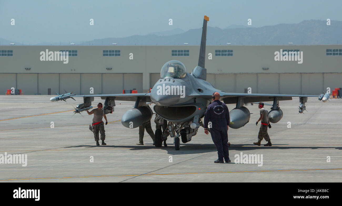 Airmen from the 35th Maintenance Squadron inspect F-16 Fighting Falcon ...