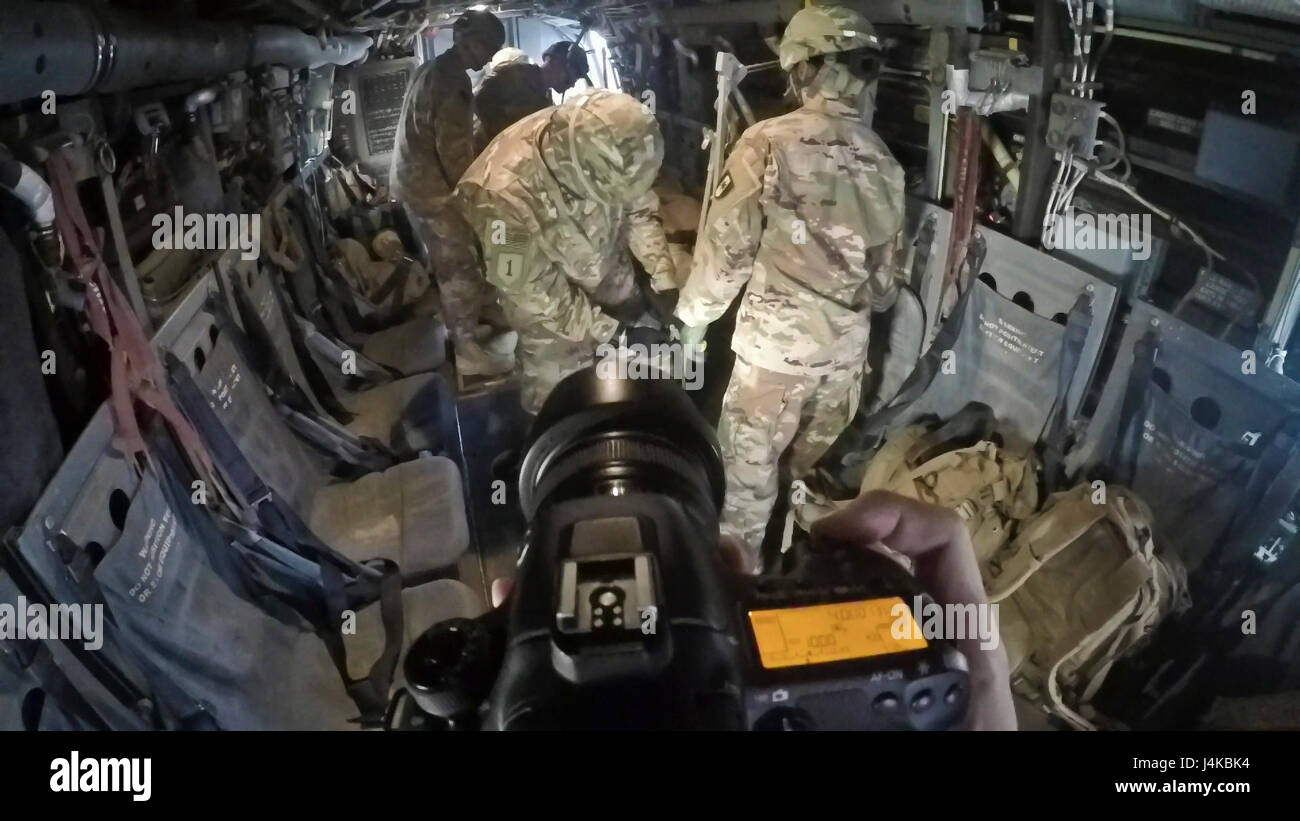 Combat medics carry a stretcher from an MV-22 Osprey during joint ...