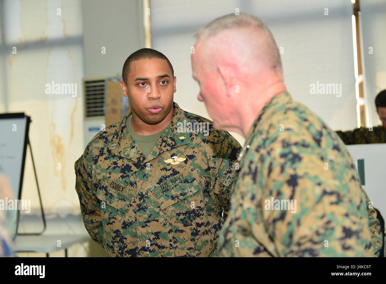 U.S. Marine Lt. Gen. Lawrence D. Nicholson talks to U.S. Navy Lt ...