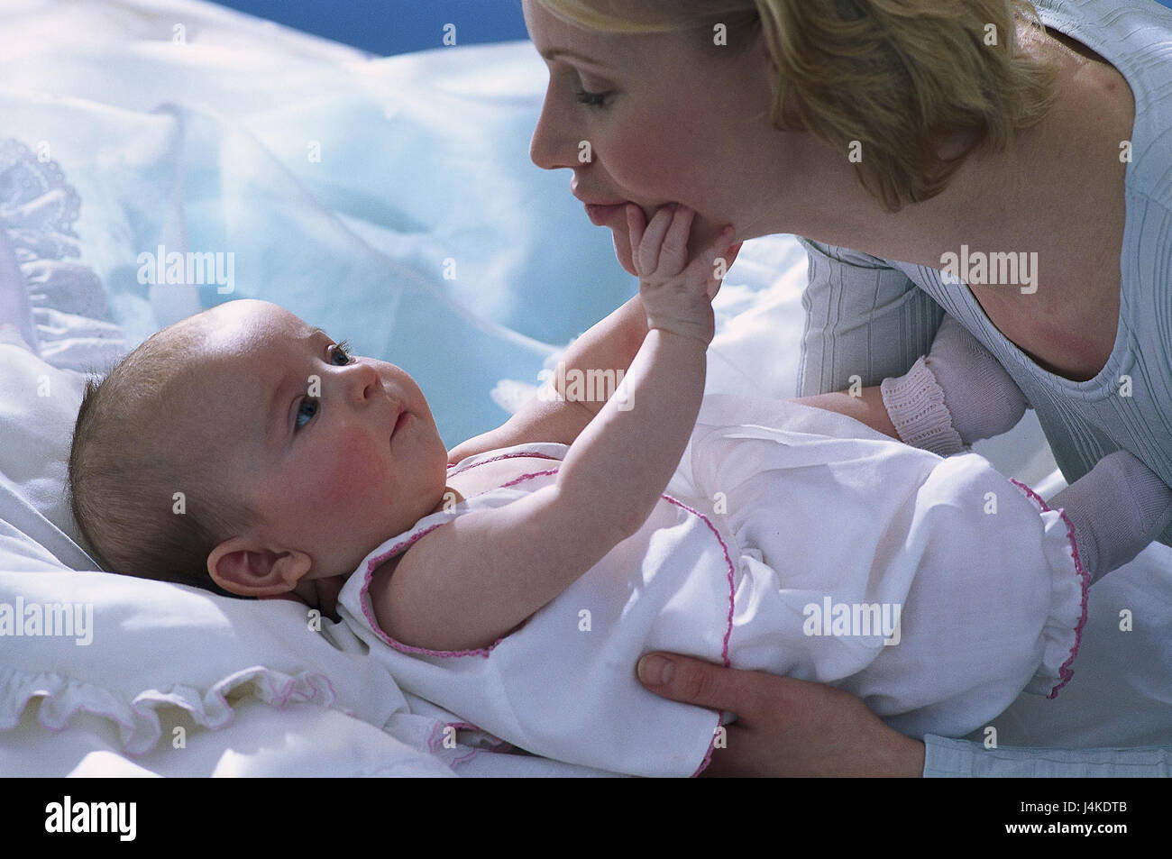 Mother, baby, eye contact, gesture inside, at home, woman, young, child ...